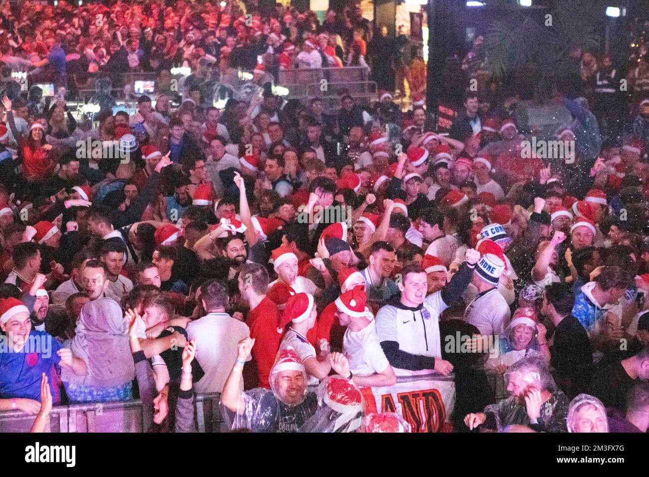 England fans throw beer in the air at Boxpark, Wembley, London, as ...