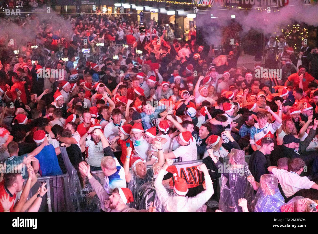 England fans throw beer in the air at Boxpark, Wembley, London, as ...