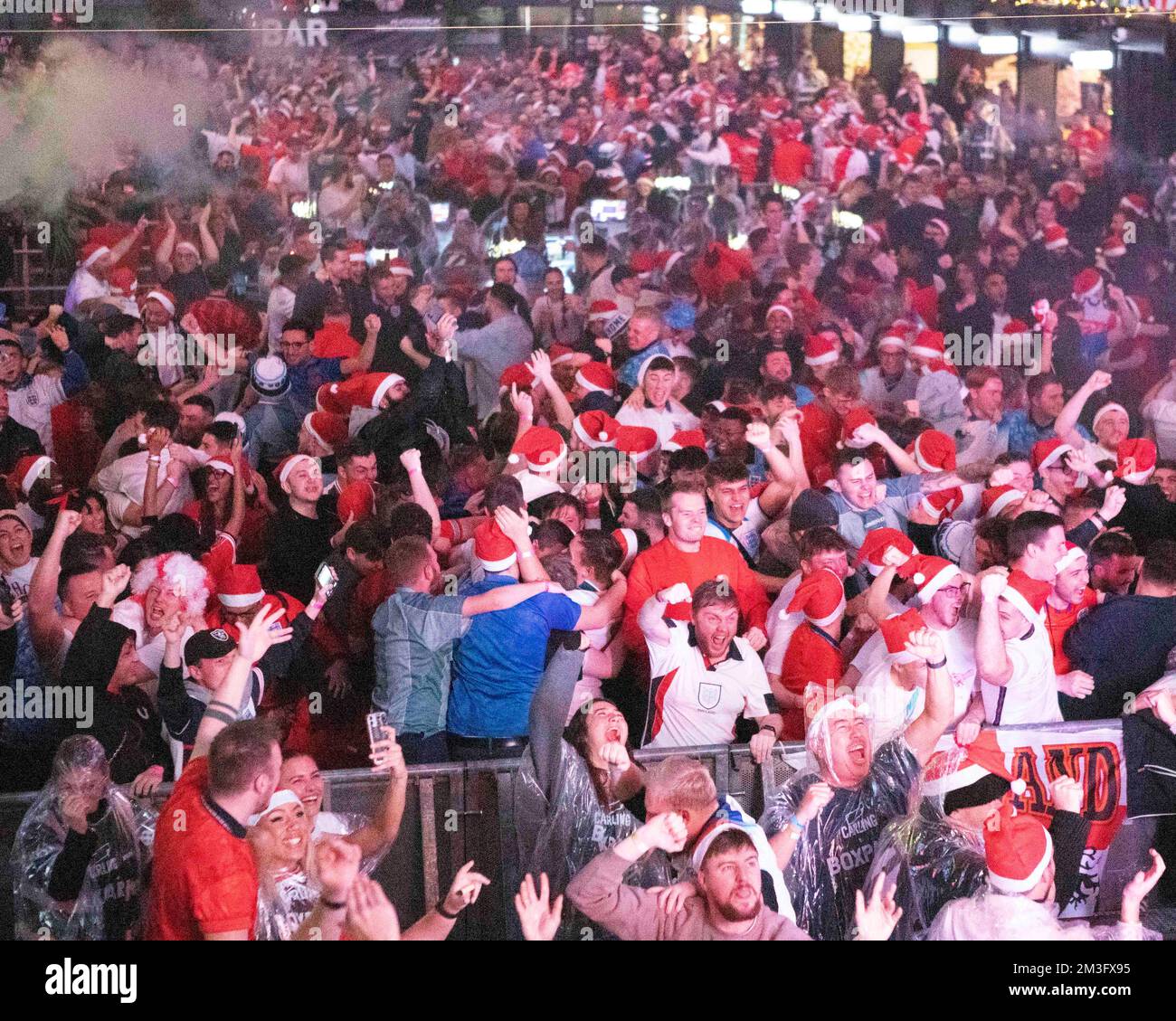 England fans throw beer in the air at Boxpark, Wembley, London, as ...