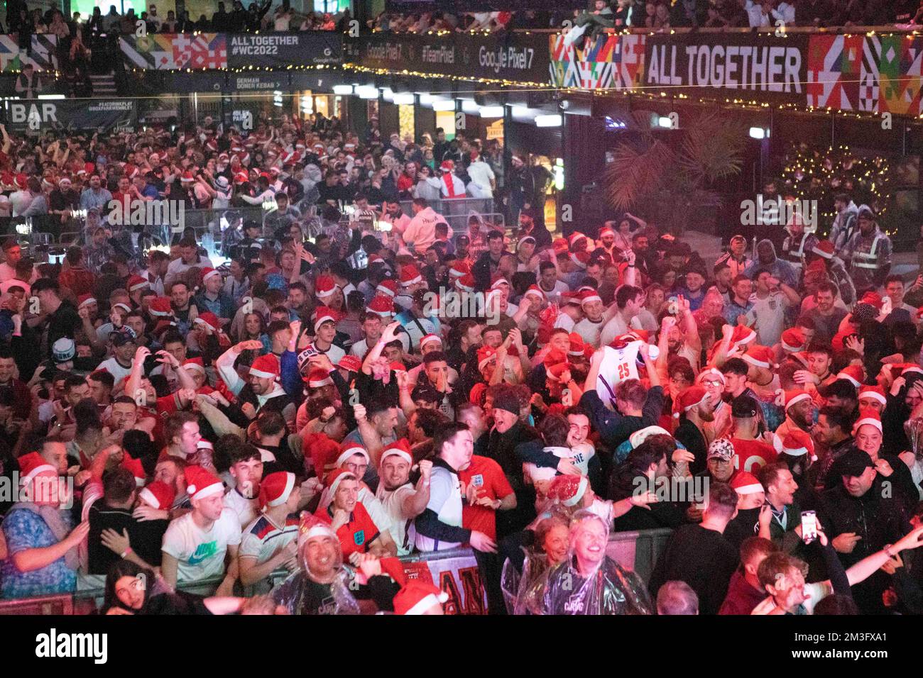 England fans throw beer in the air at Boxpark, Wembley, London, as ...