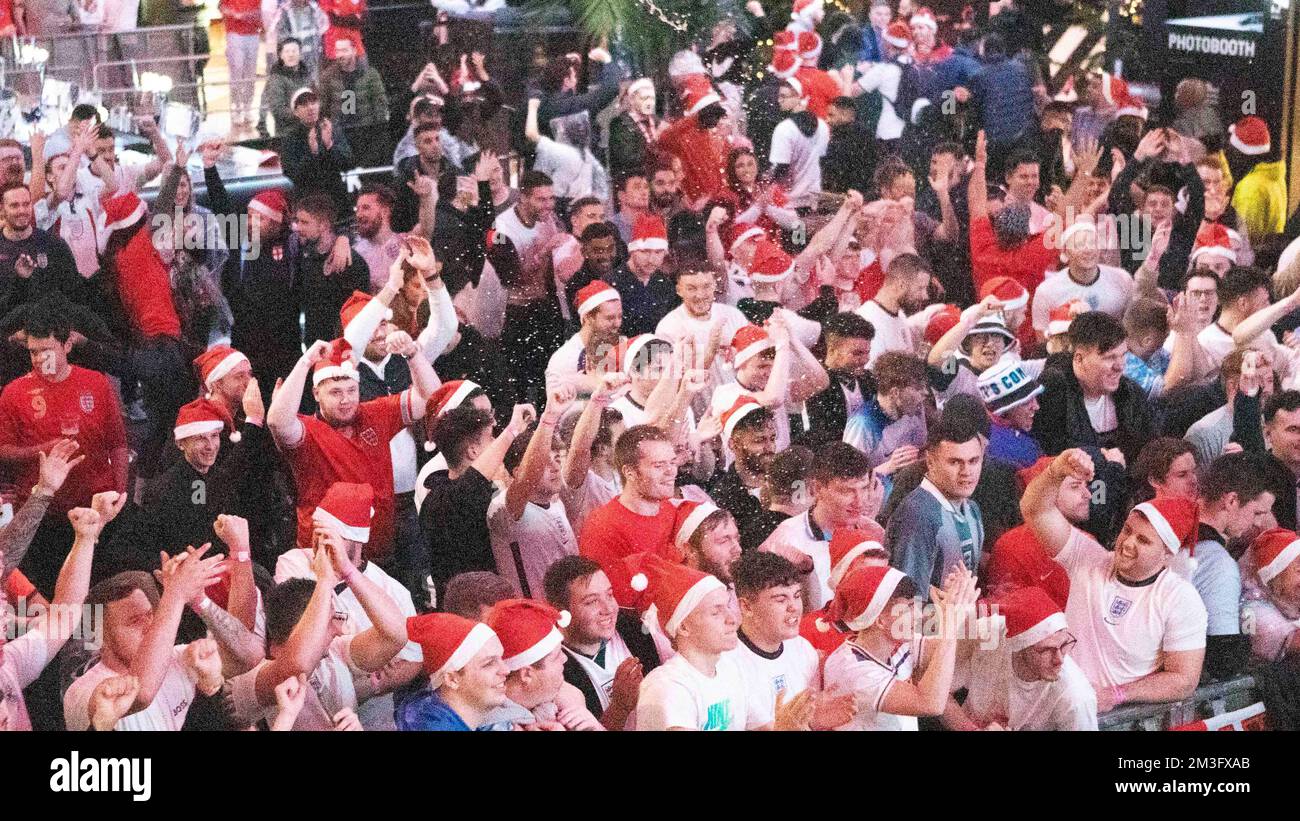 England fans throw beer in the air at Boxpark, Wembley, London, as ...