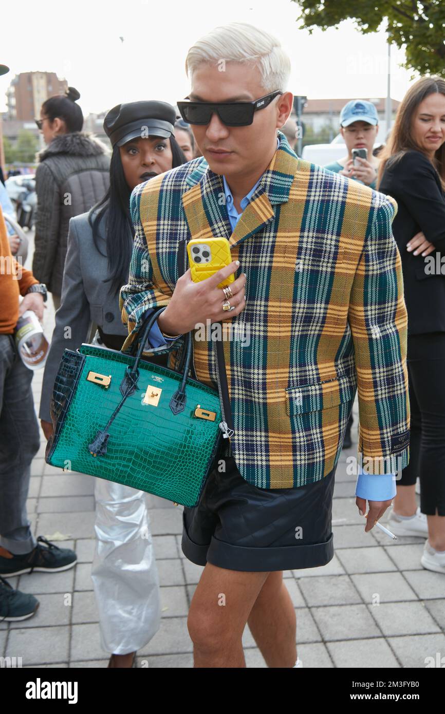 MILAN, ITALY - SEPTEMBER 23, 2022: Bryan Boy with green Hermes leather ...