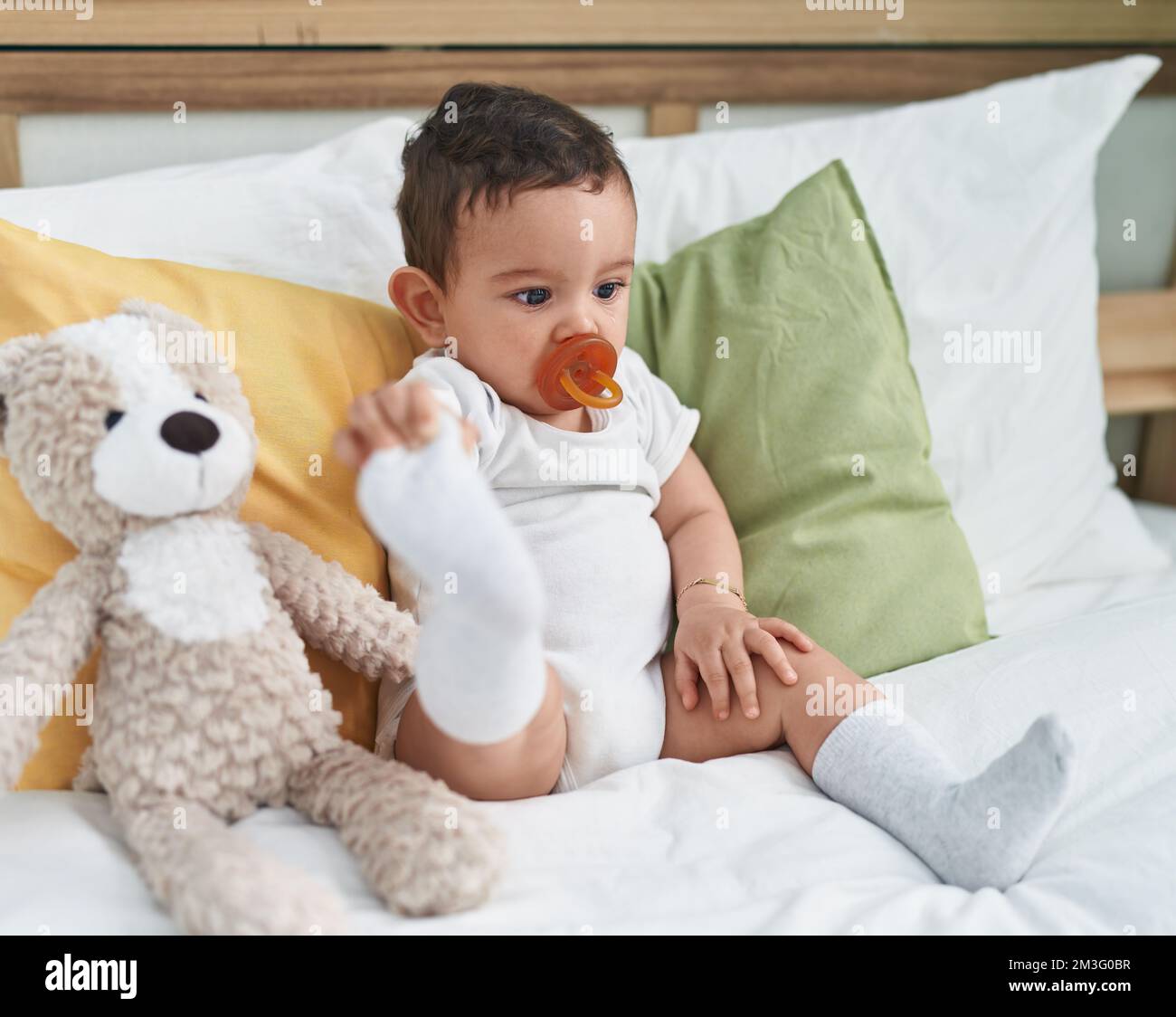 Hispanic toddler with pacifier hi-res stock photography and images - Alamy