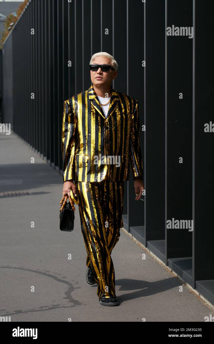 MILAN, ITALY - SEPTEMBER 23, 2022: Bryan Boy with golden and black ...