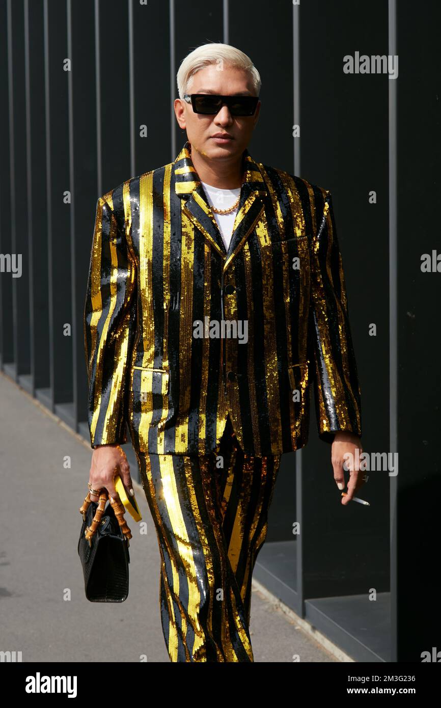 MILAN, ITALY - SEPTEMBER 23, 2022: Bryan Boy with golden and black ...