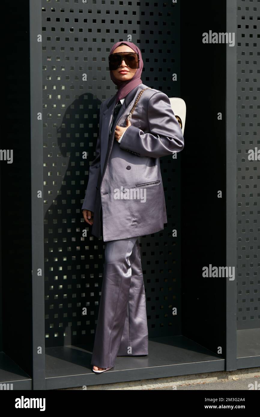 MILAN, ITALY - SEPTEMBER 23, 2022: Aya Mohamed with satin jacket and ...