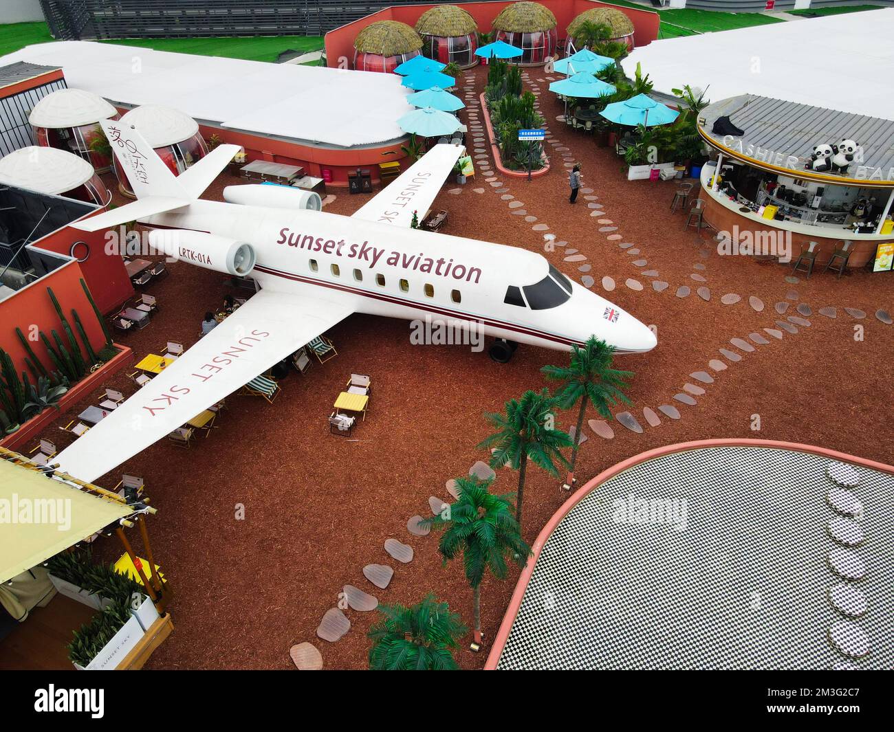 Aerial photo shows an airplane restaurant on the roof of a shopping ...