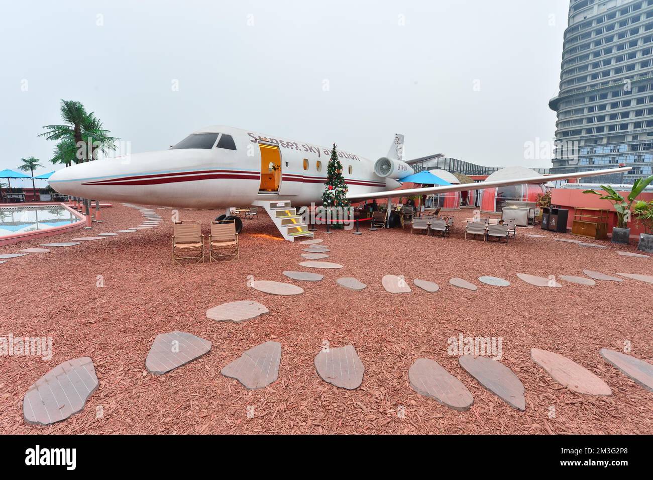 An airplane restaurant on the roof of a shopping mall in Xindu District ...