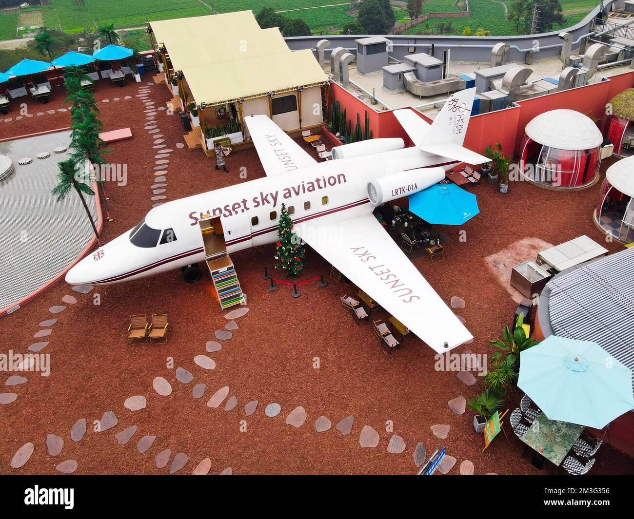 Aerial photo shows an airplane restaurant on the roof of a shopping ...