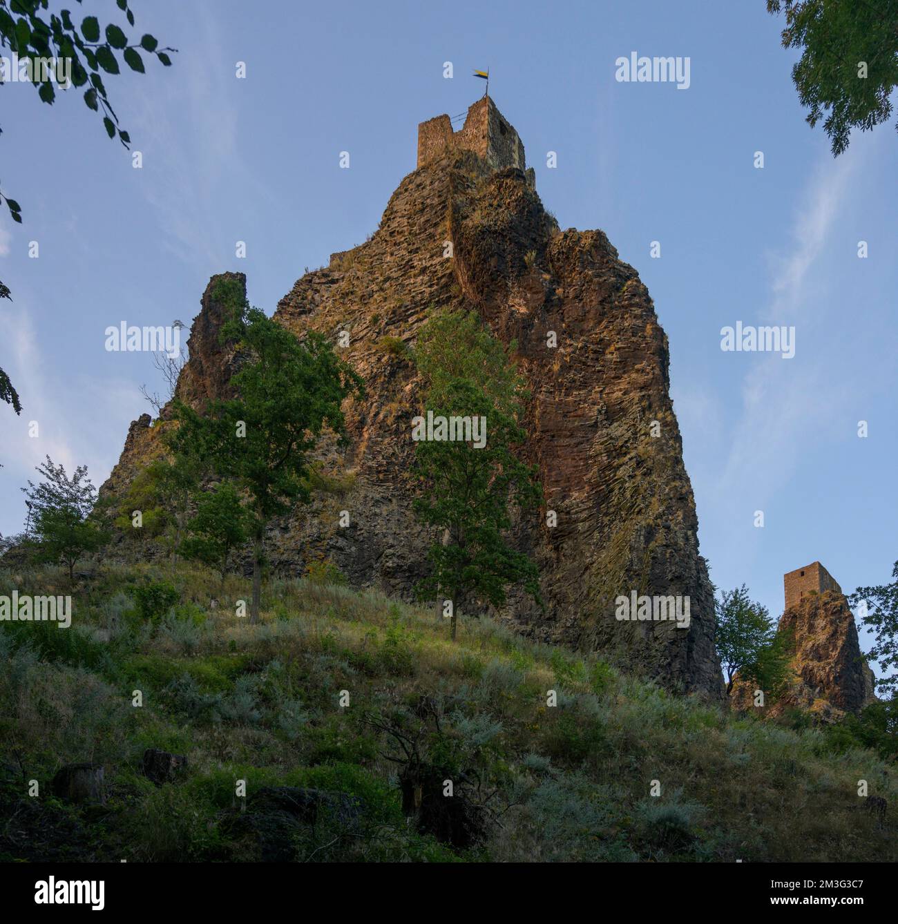 Trosky castle ruins on a basalt rock in the evening light, Troskovice ...