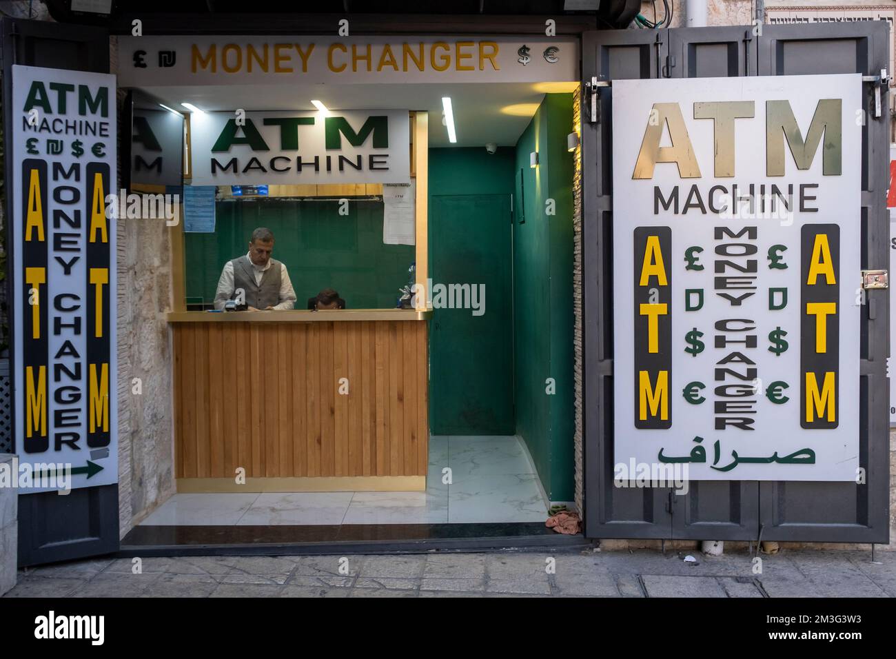 A money changer in the old city of Jerusalem Israel Stock Photo - Alamy