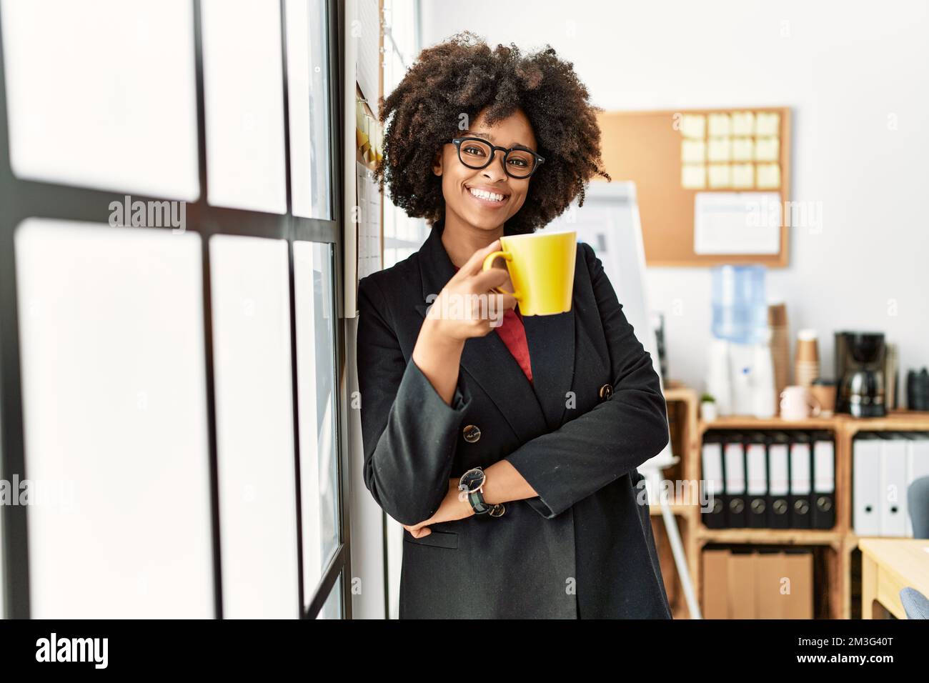 Young african american woman smiling confident drinking coffee at ...