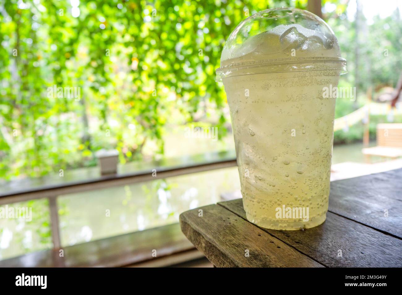 Iced lemon juice and leaves Stock Photo - Alamy
