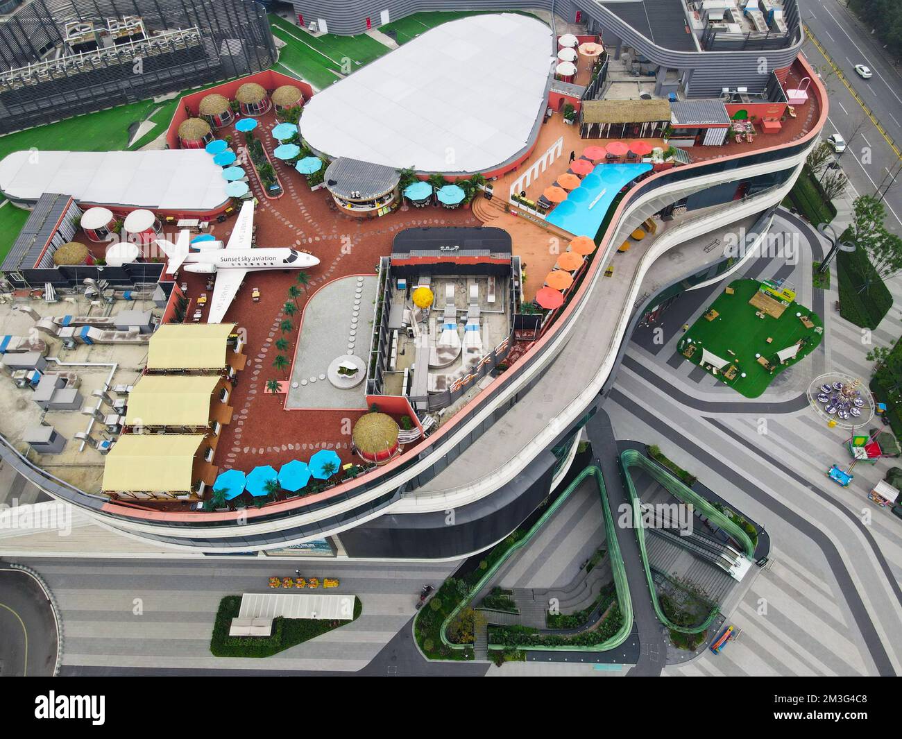 Aerial photo shows an airplane restaurant on the roof of a shopping ...