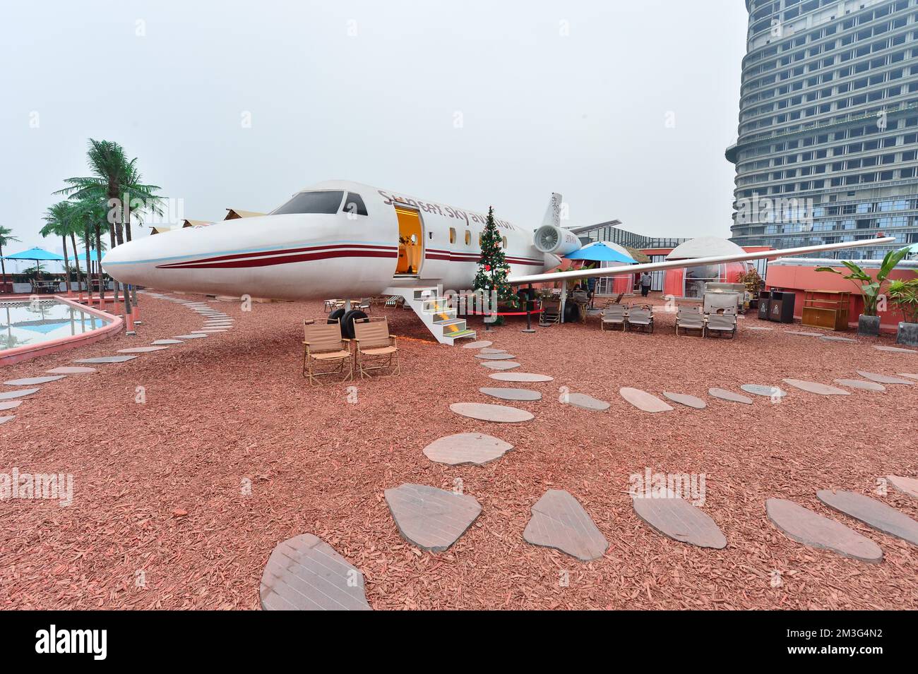 An airplane restaurant on the roof of a shopping mall in Xindu District ...