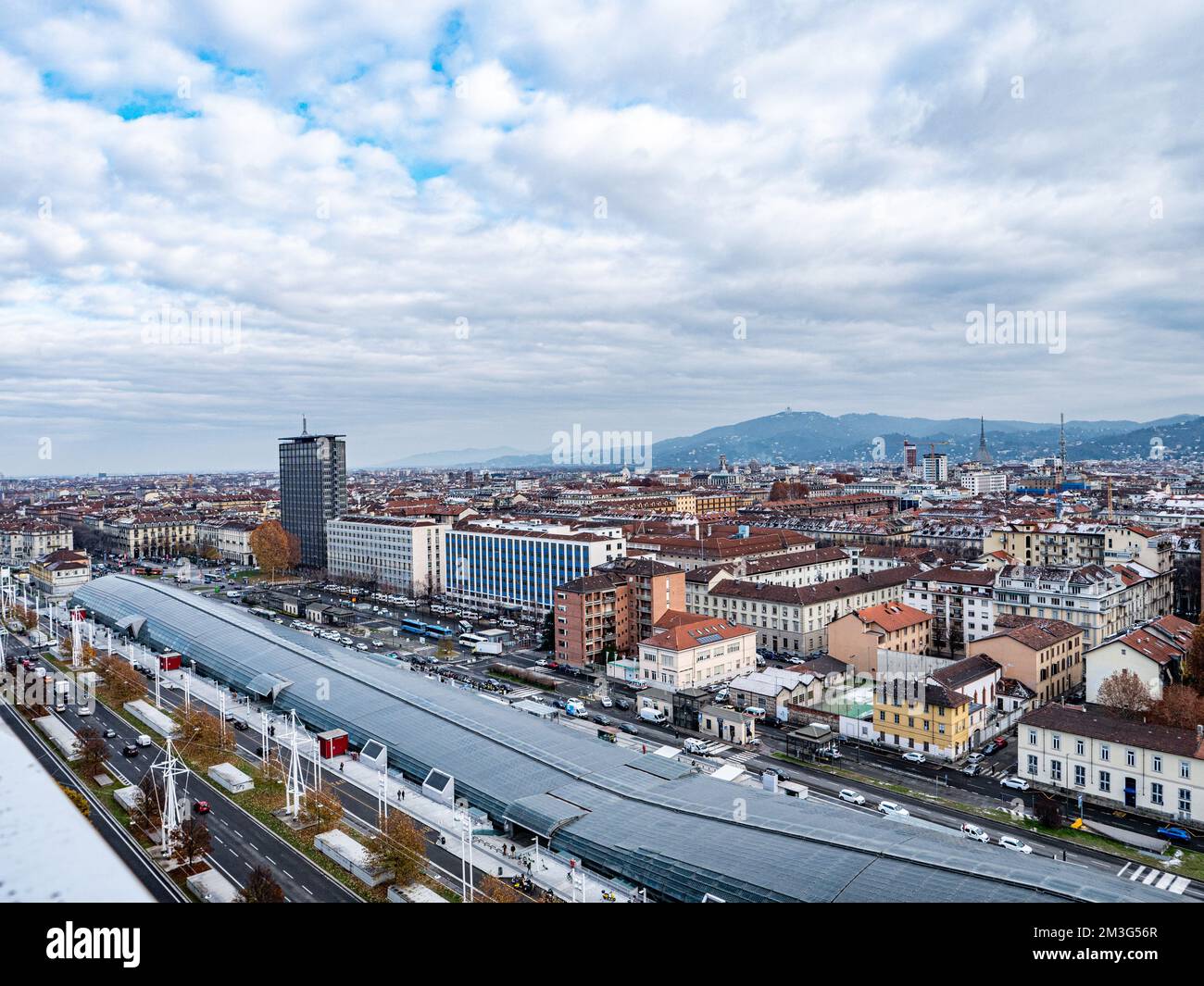 Skyline of Turin, Italy, in winter. The mountain in back and the Mole ...