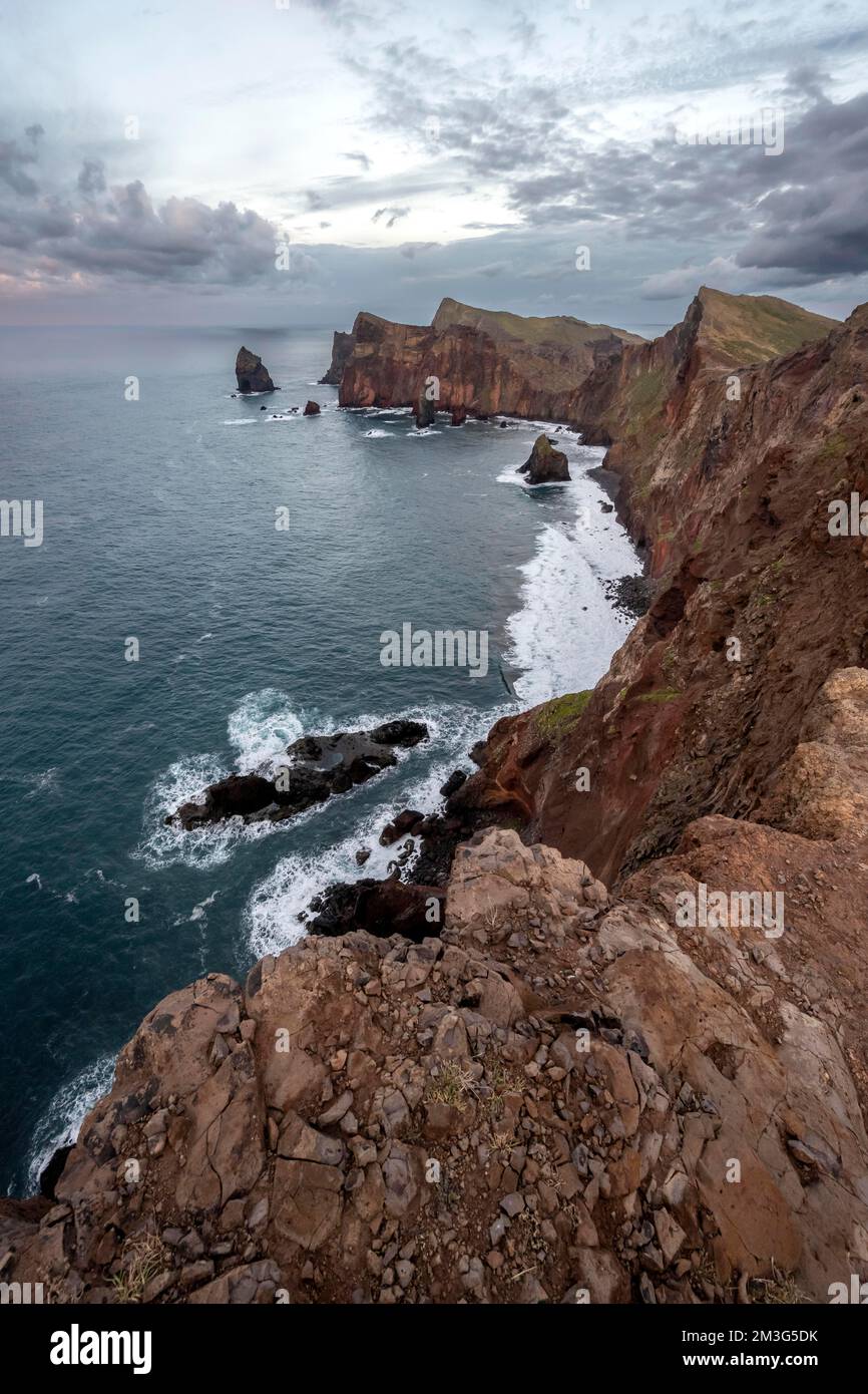 Red cliffs and rocks in the sea, coastal landscape, Miradouro do ...