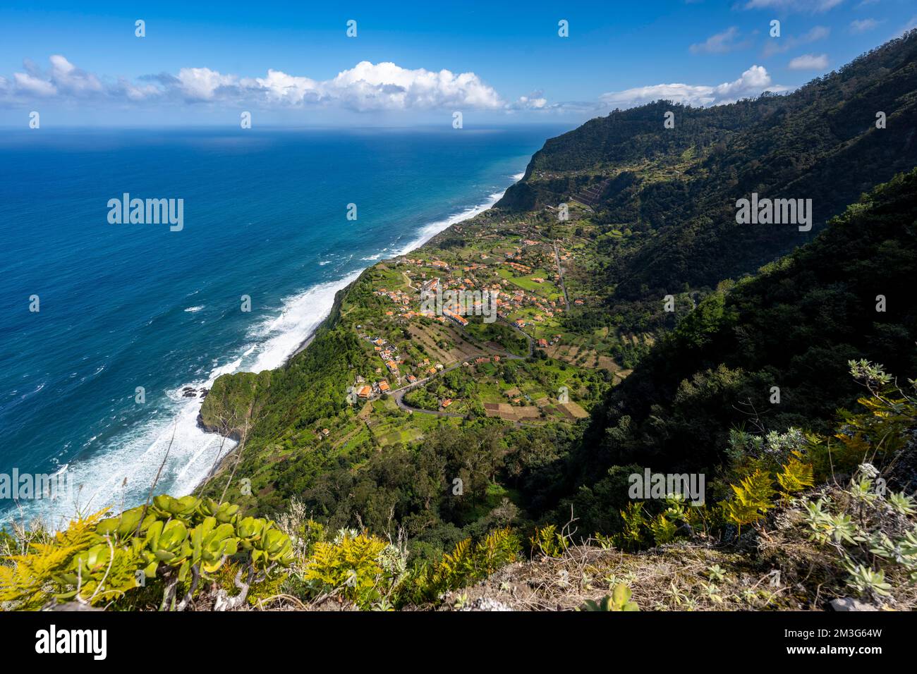Ridge of Pico do Alto, view of coast and sea with village Arco de Sao Jorge, Madeira, Portugal ...