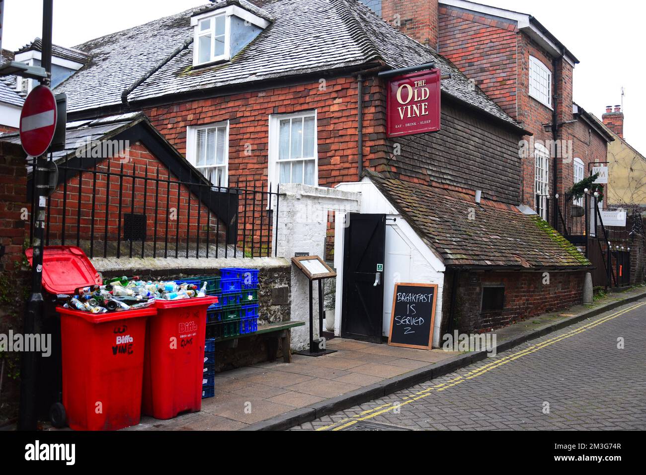 Pub rear entrance with menu board Stock Photo - Alamy