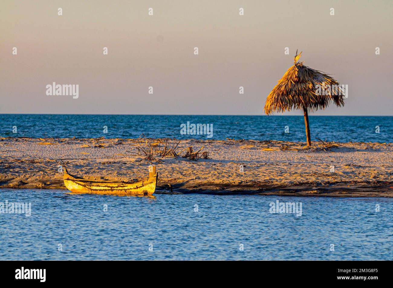 Little sailing boat on a sand tongue below the Antsanitia beach resort ...