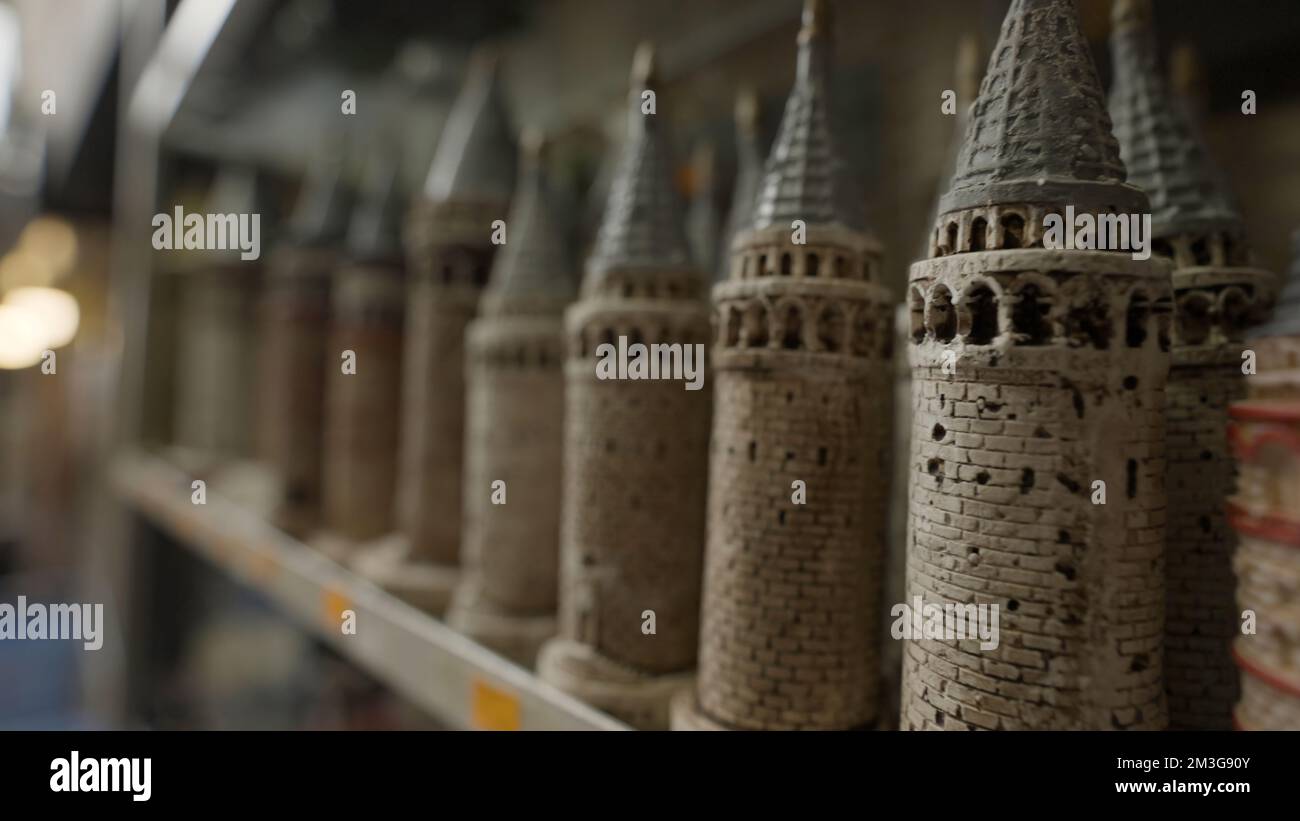 Souvenirs. Action. Wooden neatly made turrets that are sold on the ...