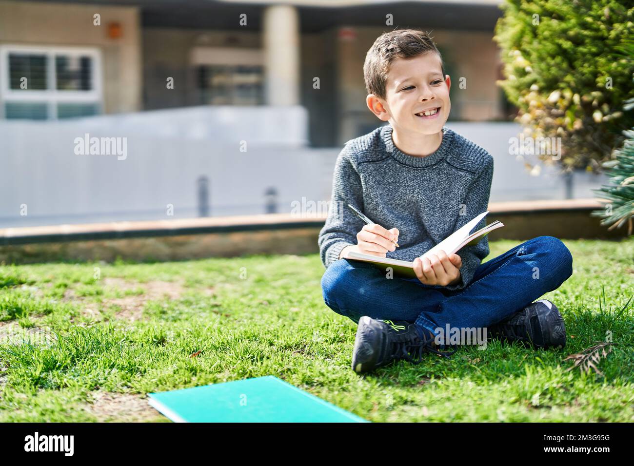 Child garden park writing hi-res stock photography and images - Alamy