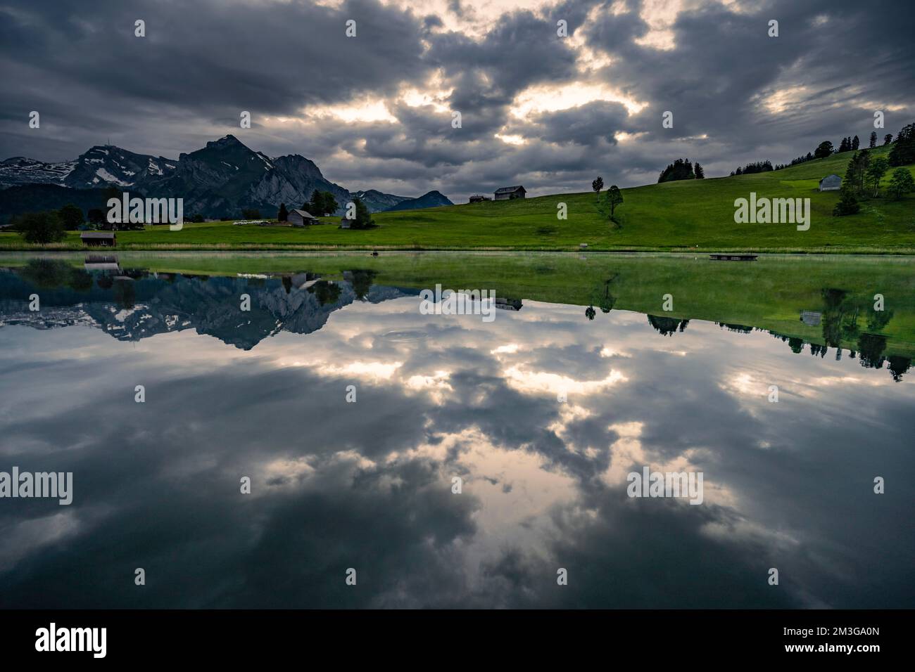 Schwendisee with reflection of the Altmann peak, Wildhaus, Appenzell ...