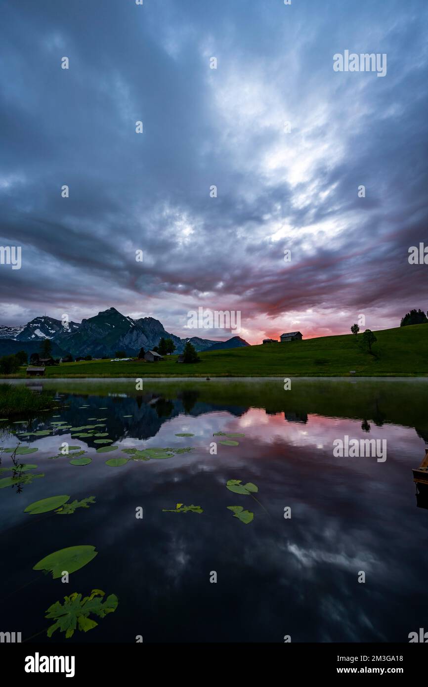 Schwendisee with reflection of the Altmann peak, Wildhaus, Appenzell ...