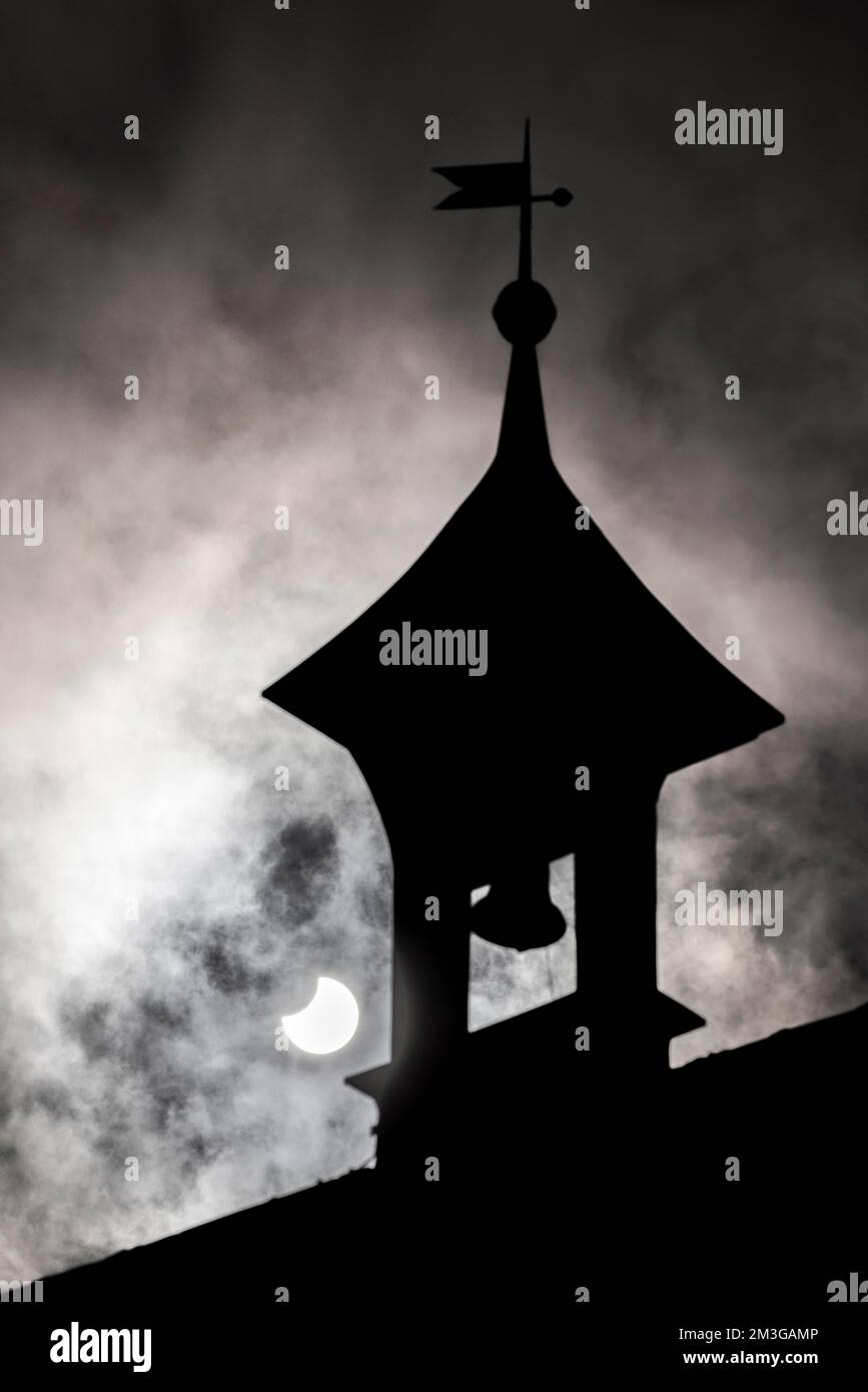 Partial solar eclipse on 25. 10. 2022, town hall, Allensbach, Baden-Wuerttemberg, Germany Stock ...