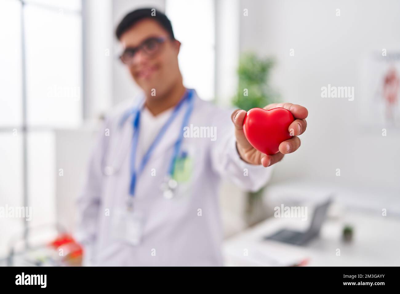Man down syndrome doctor hi-res stock photography and images - Alamy