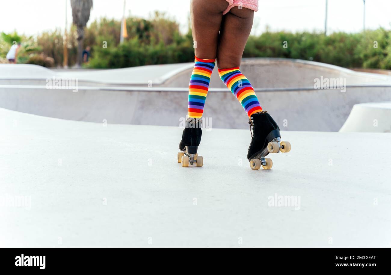 Beautiful woman skating with roller skates and having fun. Professional ...