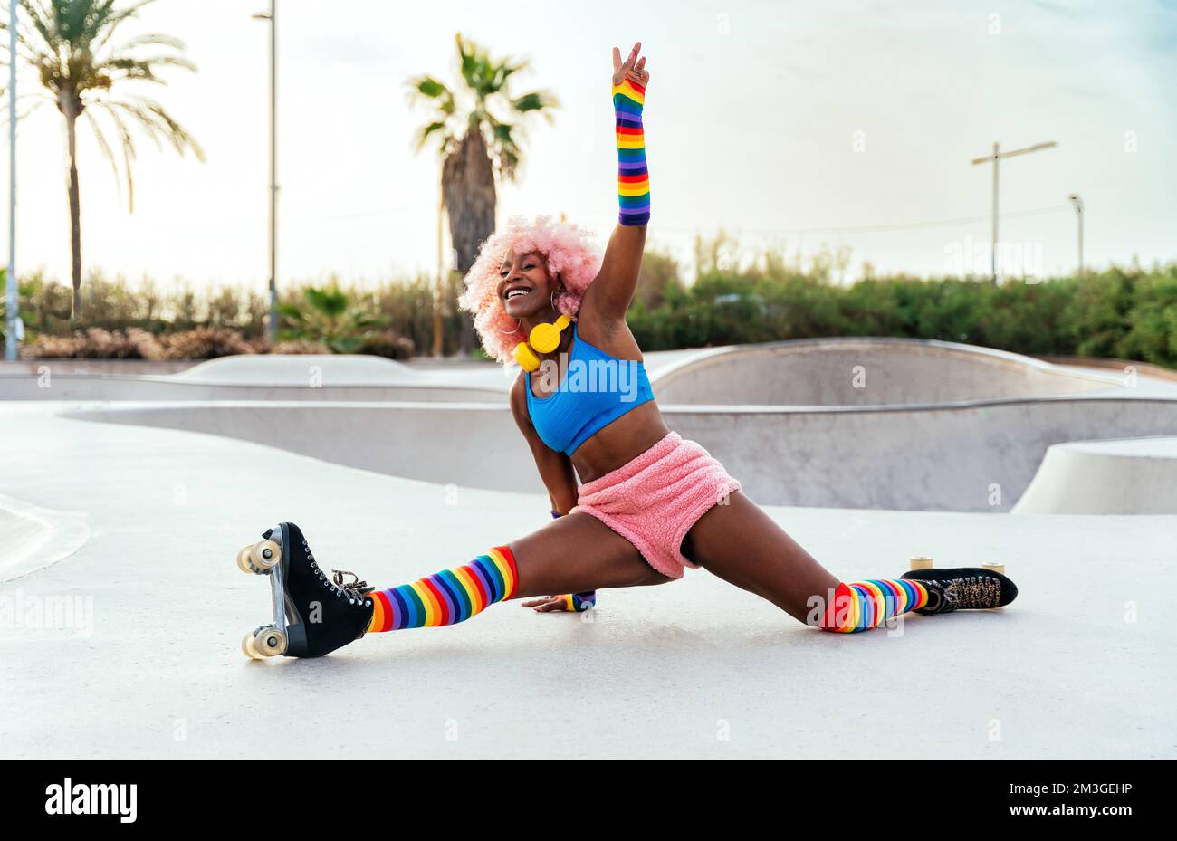 Beautiful woman skating with roller skates and having fun. Professional ...