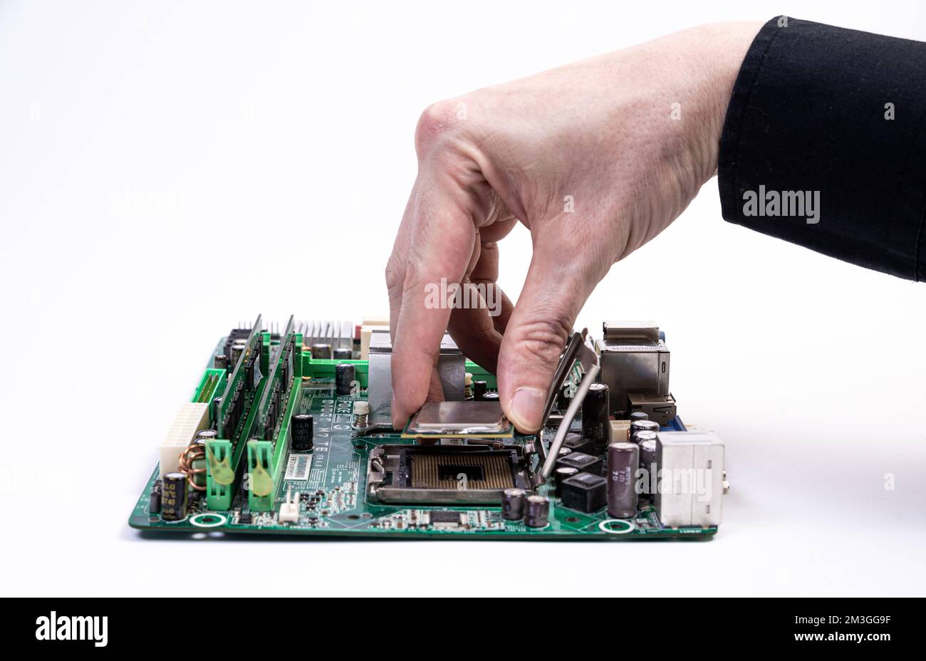 Engineer repairman holding hands in black gloves chip processor, CPU to ...