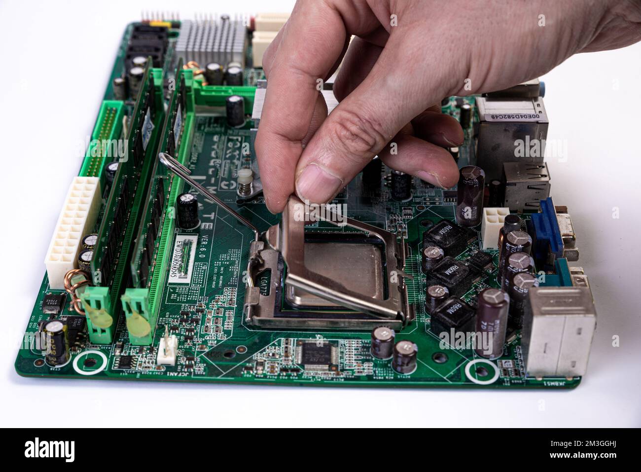 Engineer repairman holding hands in black gloves chip processor, CPU to insert into the socket ...