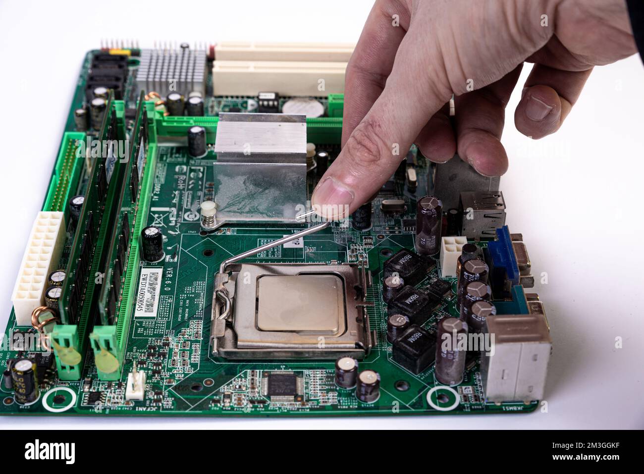 Engineer repairman holding hands in black gloves chip processor, CPU to ...