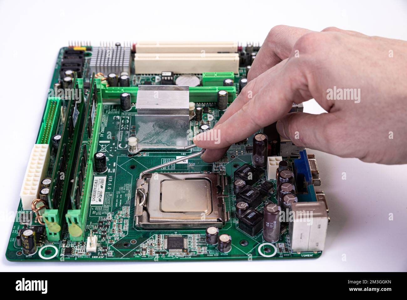 Engineer repairman holding hands in black gloves chip processor, CPU to ...