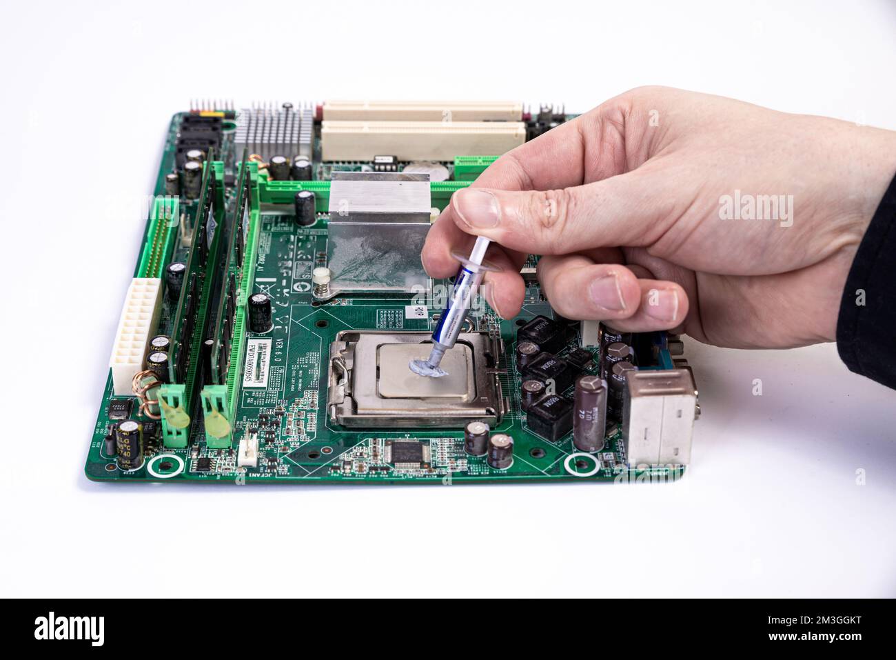 Engineer repairman holding hands in black gloves chip processor, CPU to insert into the socket ...