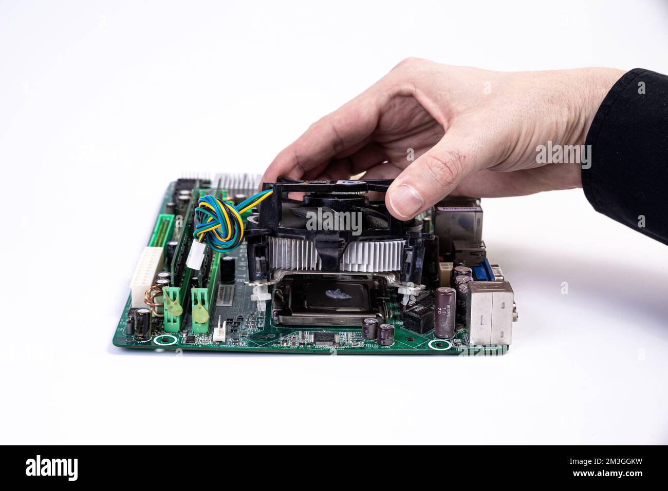 Engineer repairman holding hands in black gloves chip processor, CPU to insert into the socket ...