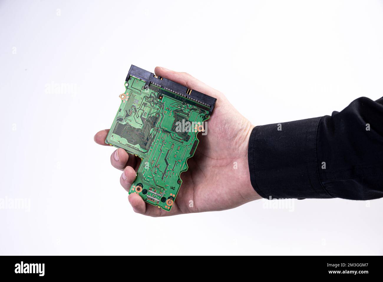 Engineer repairman holding hands in black gloves chip processor, CPU to ...
