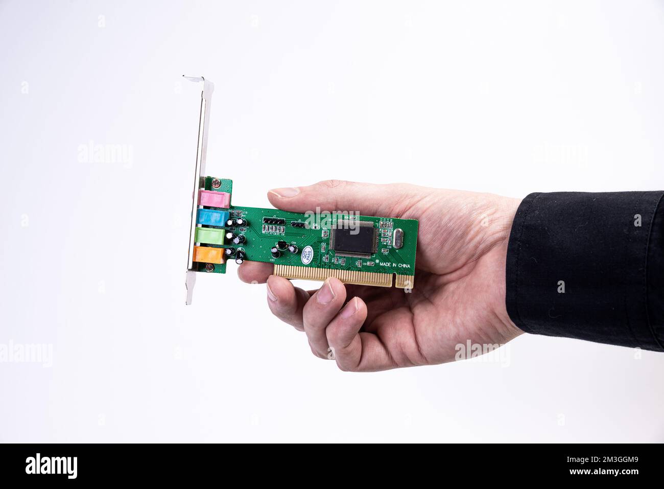 Engineer repairman holding hands in black gloves chip processor, CPU to ...