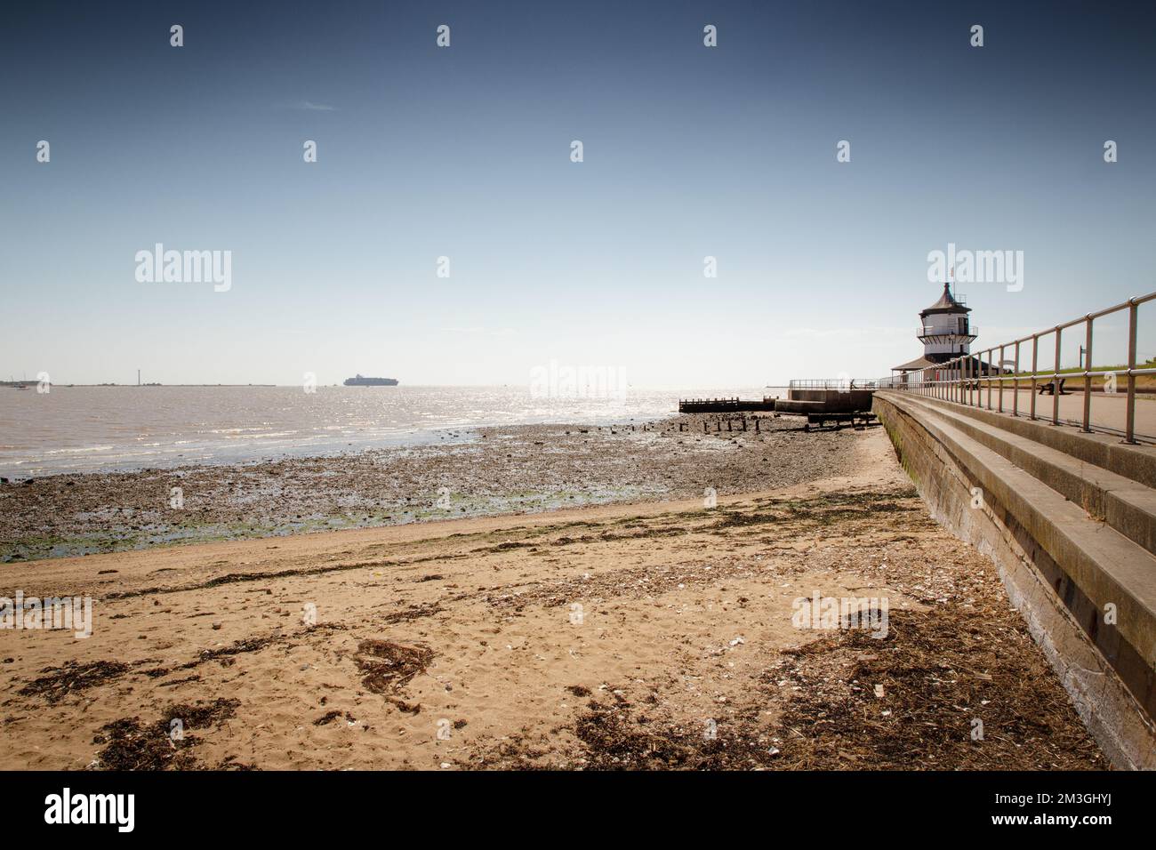 landscape image of the low lighthouse in harwich looking out to sea at ...