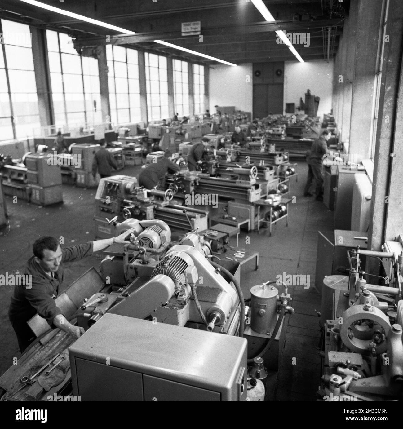 Older workers are retrained in metal trades as locksmiths and lathe ...