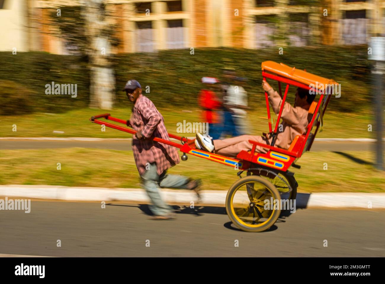 Walking rickshaw in Antsirabe, Madagascar, Indian Ocean Stock Photo - Alamy