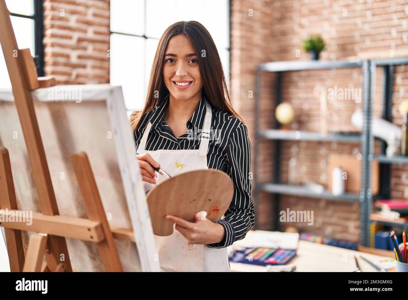 Young beautiful hispanic woman artist smiling confident drawing at art ...