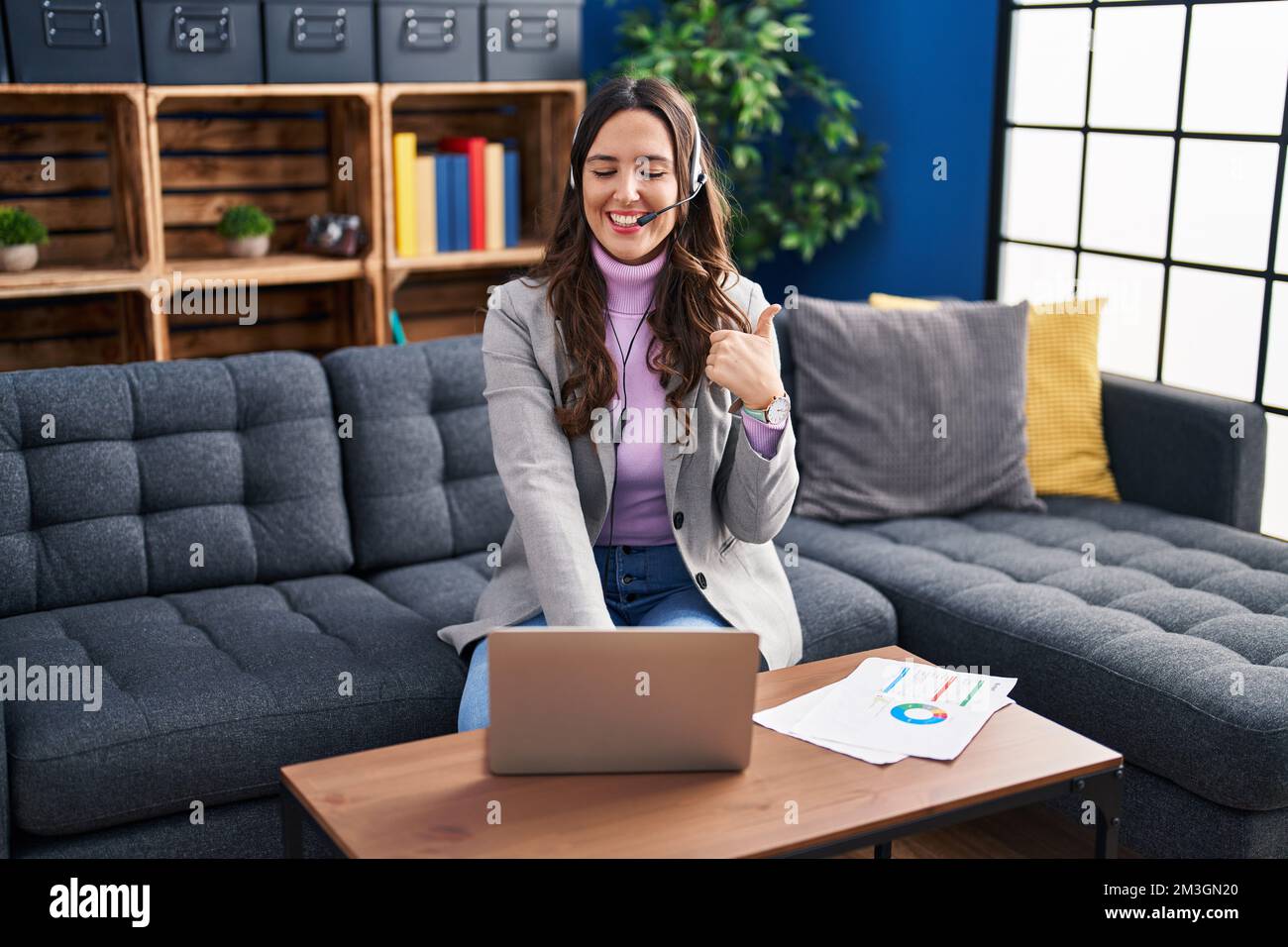 Young brunette woman working using computer laptop smiling happy and ...