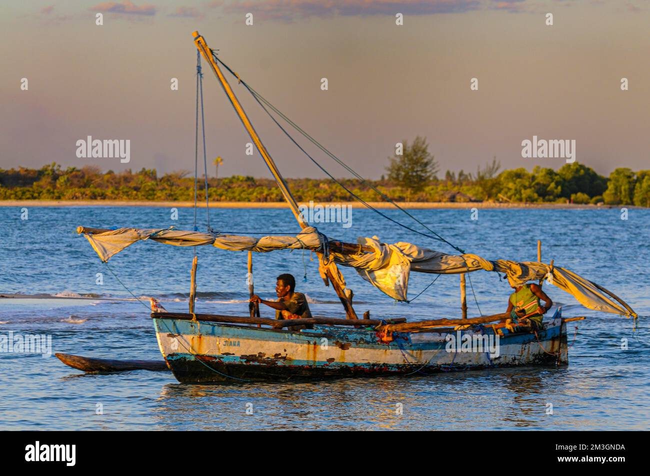 Traditional sailing boat in the waters of the Antsanitia beach resort ...