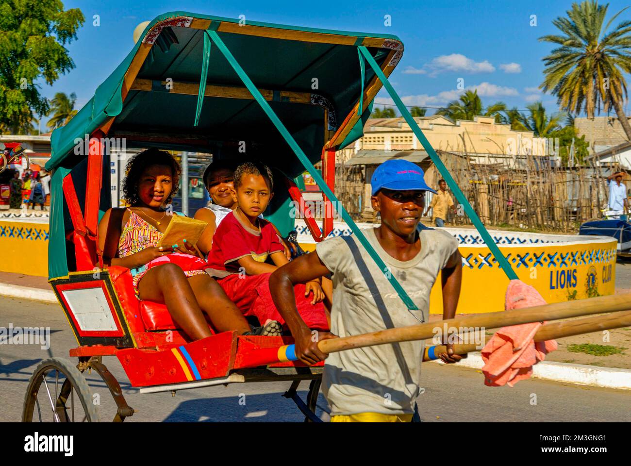 Man running with his walking rickshaw, Toliara, Madagascar Stock Photo ...
