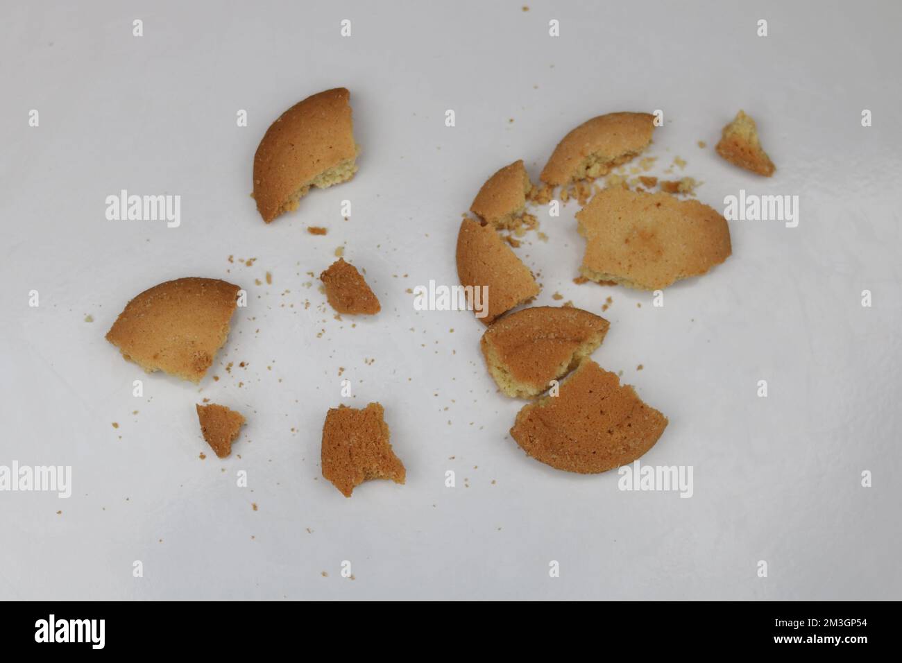 Close-up biscuits broken cookies isolated,butter biscuit on a white ...