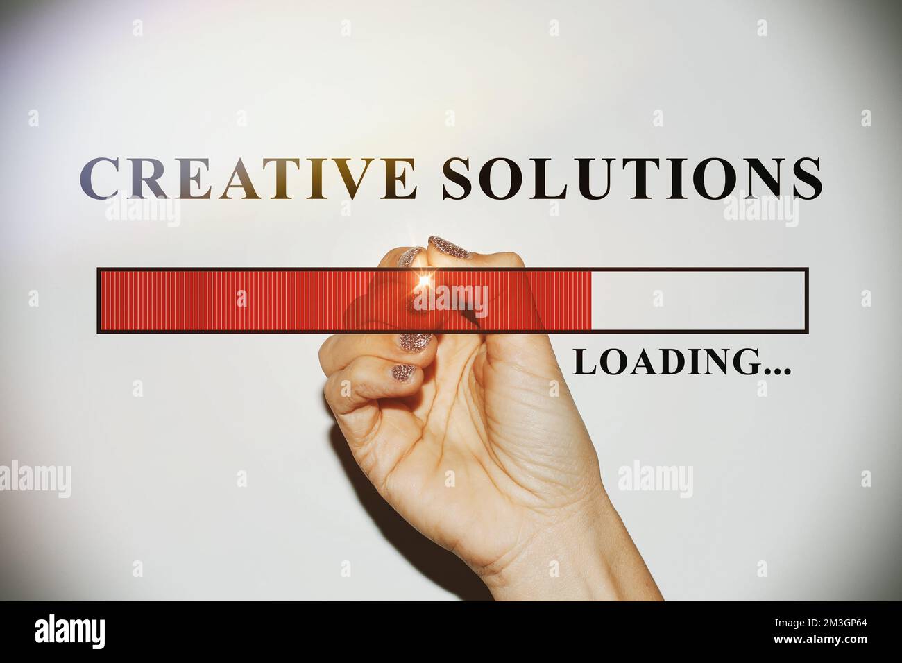 Woman hand with glitter nails showing the Loading Bar with the text ...