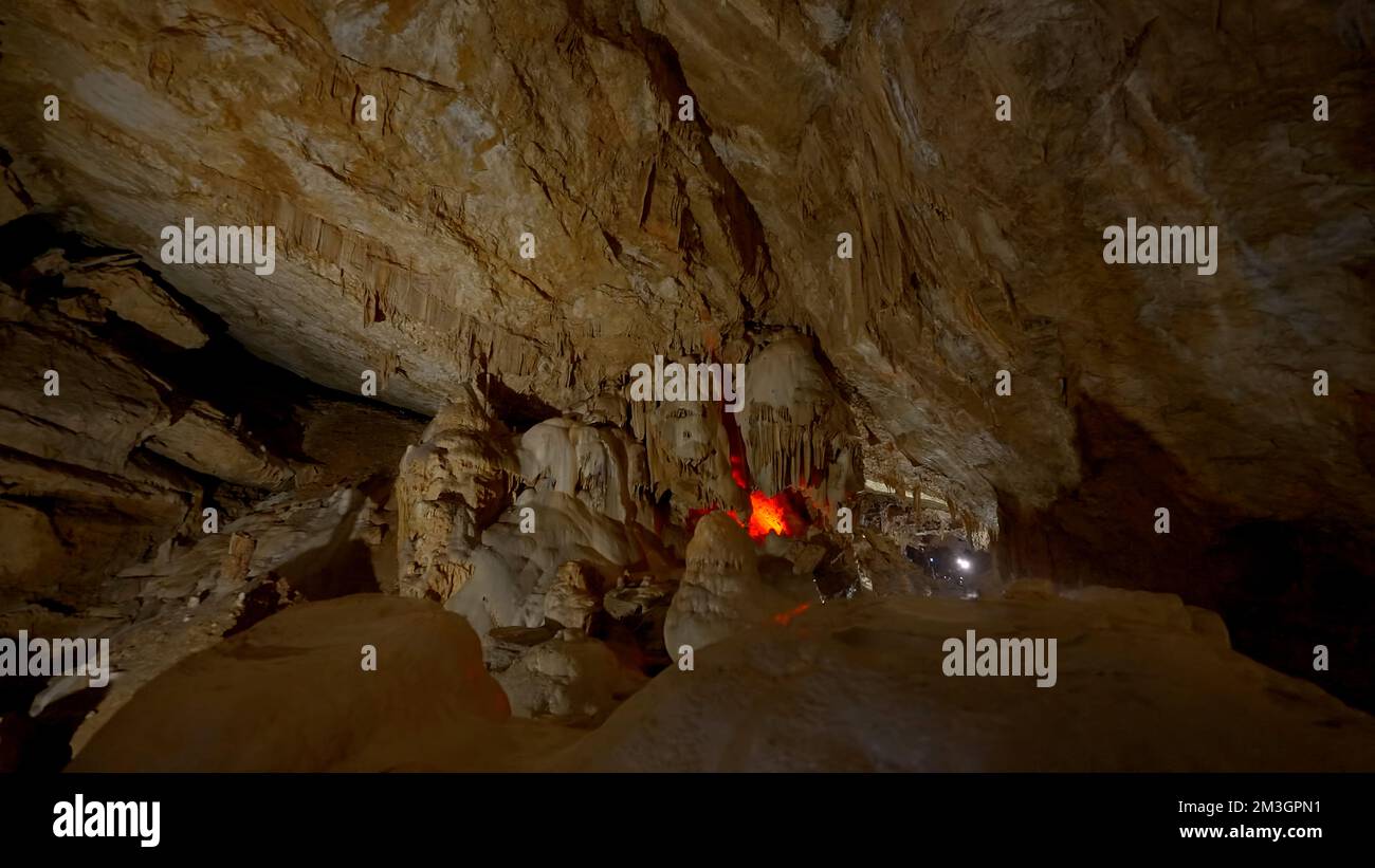 A large stone cave. Action.A gray dungeon with huge stones inside and a ...